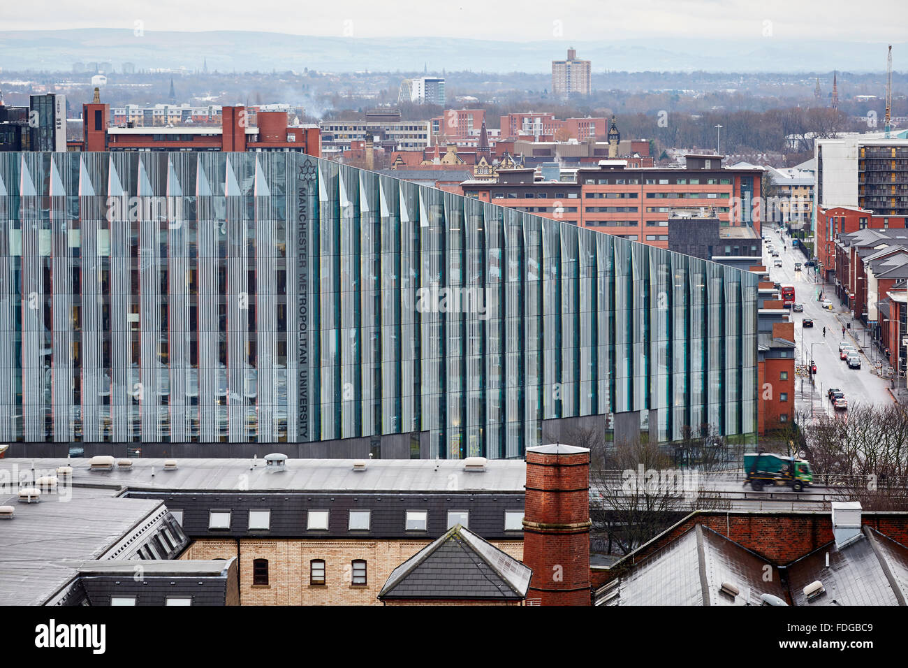 Manchester Metropolitan University building and the Mancunian Way rain ...