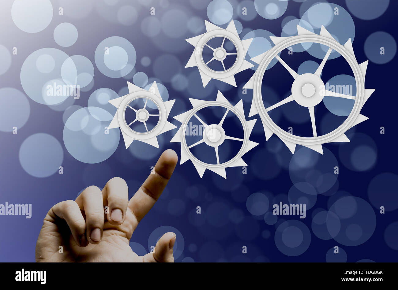 Close up human hand pointing with finger at gears mechanism Stock Photo ...