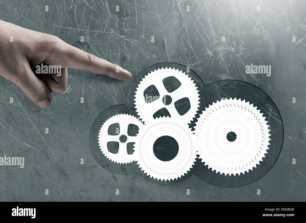 Close up human hand pointing with finger at gears mechanism Stock Photo ...