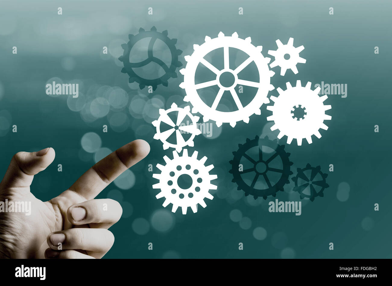 Close up human hand pointing with finger at gears mechanism Stock Photo ...