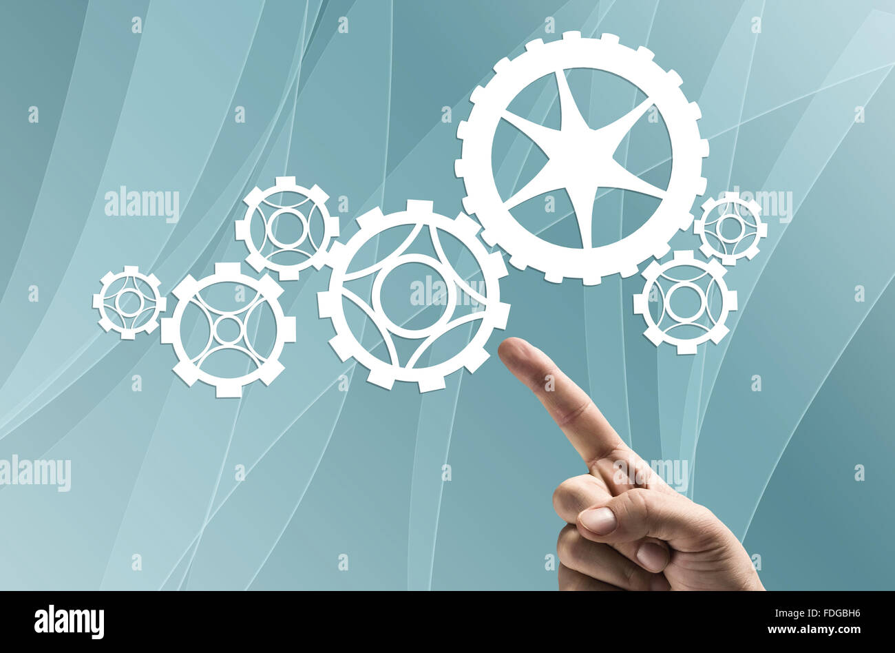 Close up human hand pointing with finger at gears mechanism Stock Photo ...