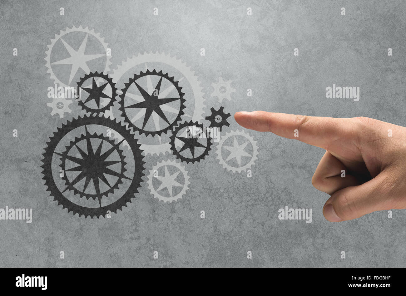Close up human hand pointing with finger at gears mechanism Stock Photo ...