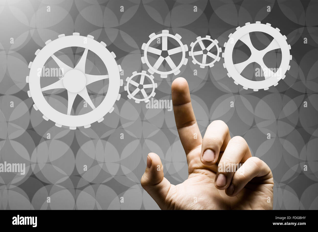 Close up human hand pointing with finger at gears mechanism Stock Photo ...