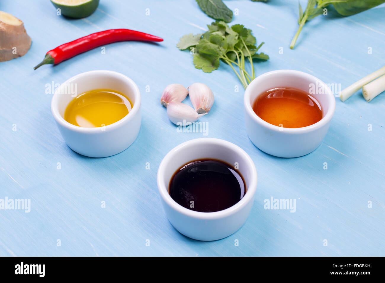 Food ingredients and kitchen utensils for cooking on wooden background ...