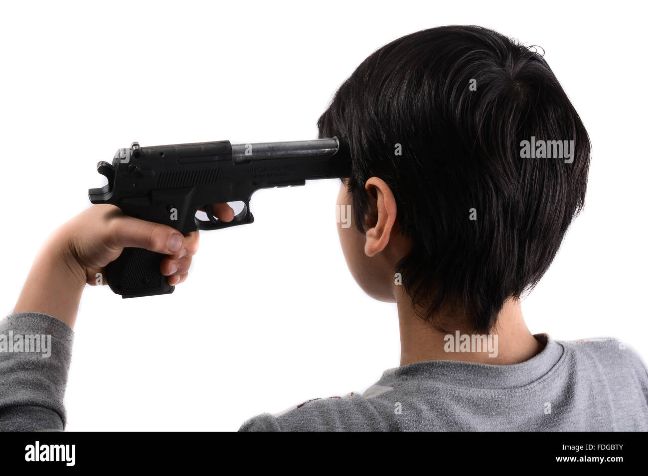 pointing head with gun in hand on a white background Stock Photo - Alamy