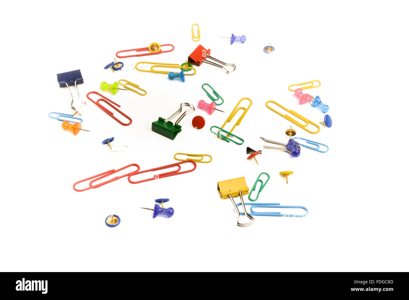 colourful paper clips scattered around on a white background Stock ...