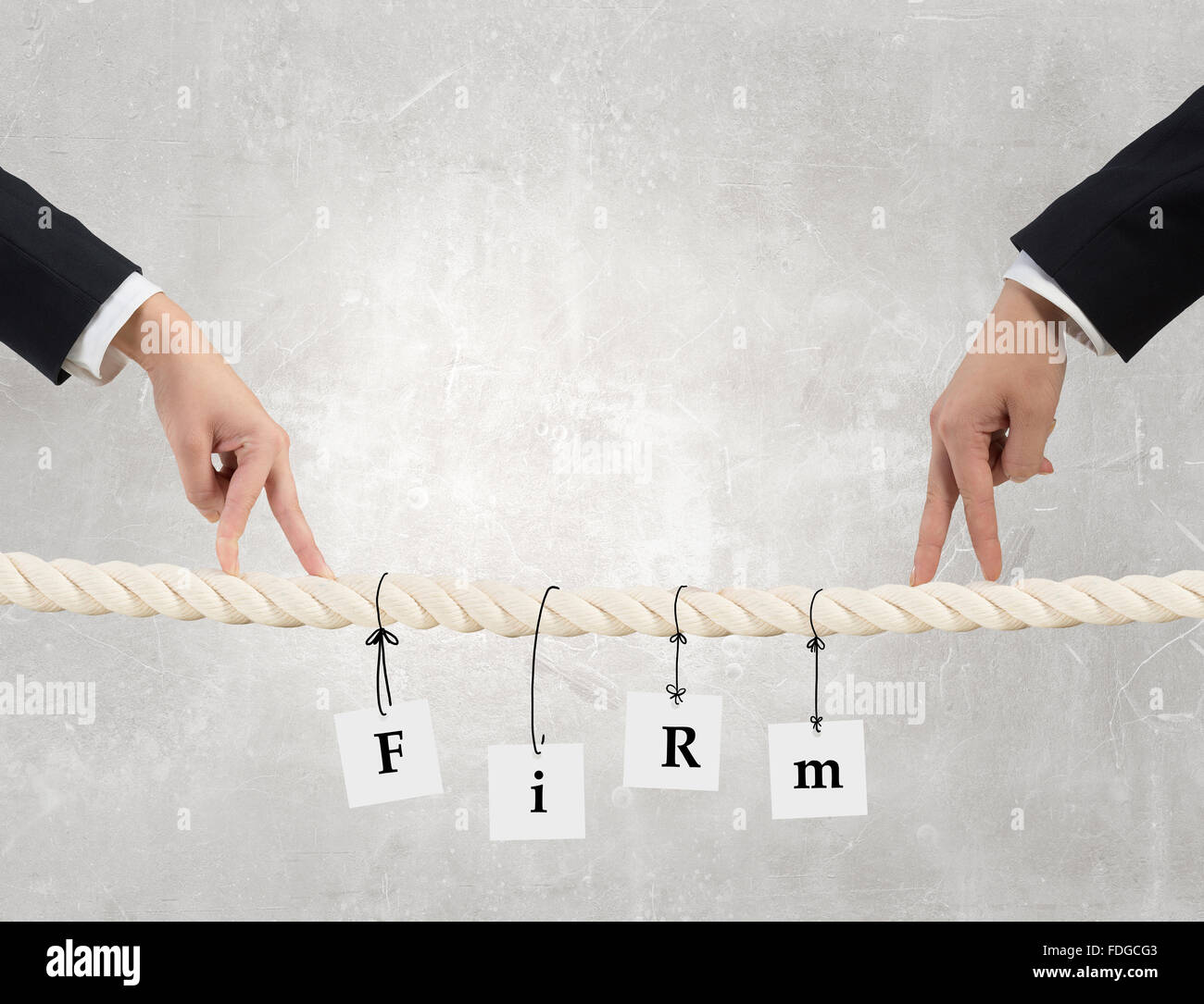 Close up of businessman hands walking with fingers on rope as ...