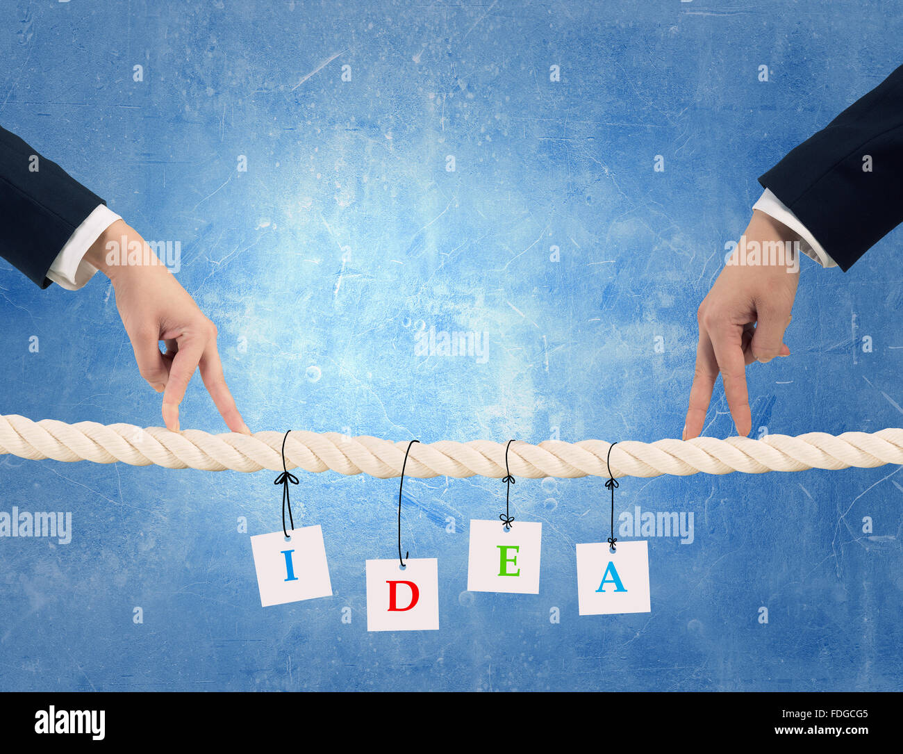 Close up of businessman hands walking with fingers on rope as ...