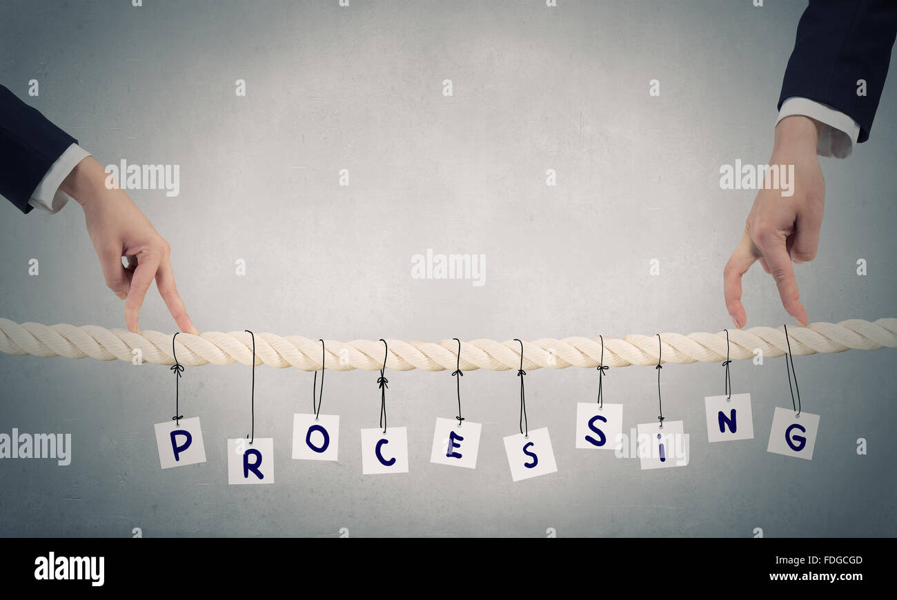 Close up of businessman hands walking with fingers on rope as ...