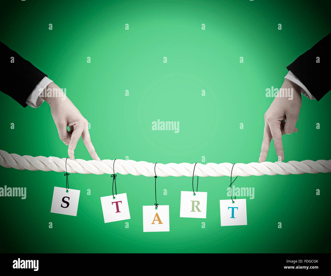 Close up of businessman hands walking with fingers on rope as ...
