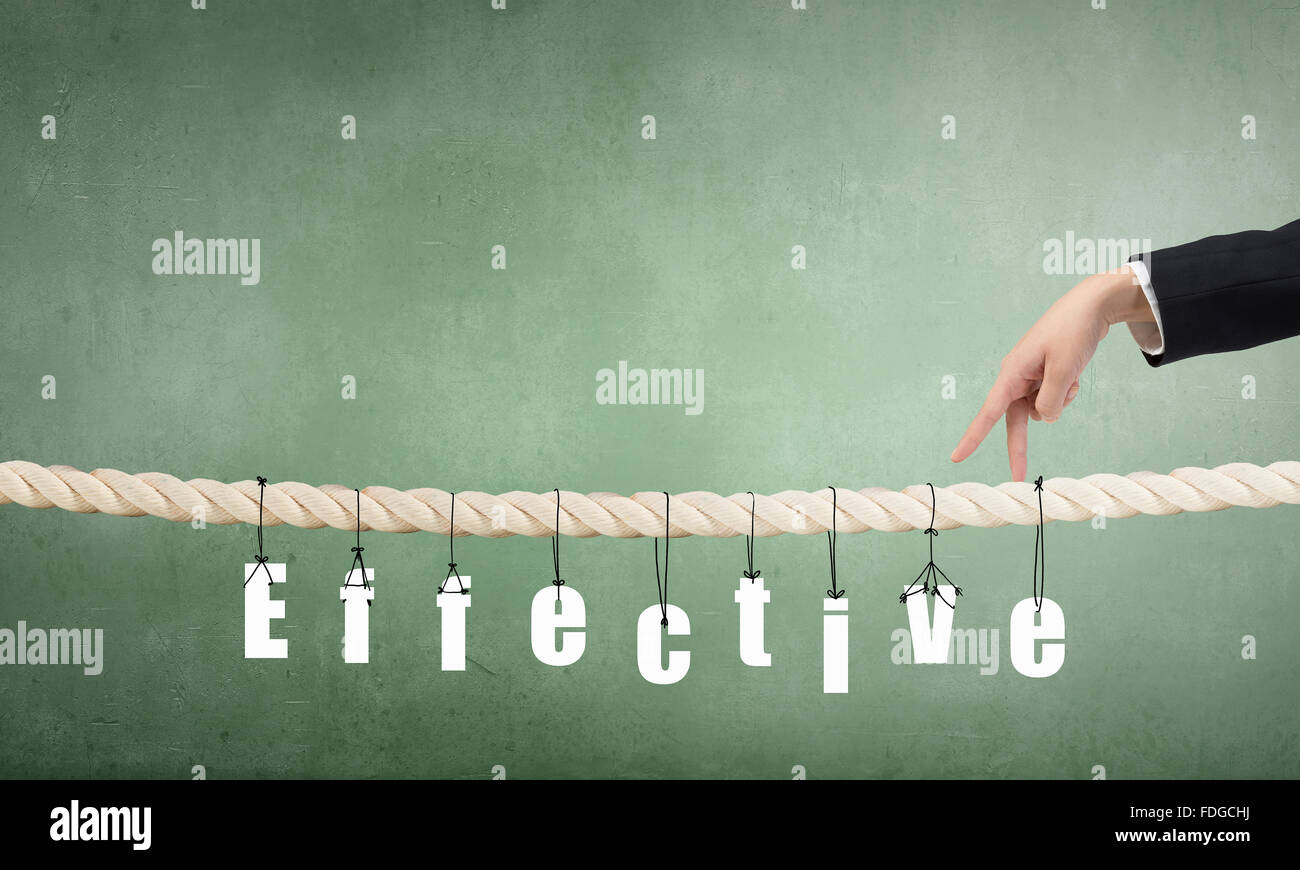 Close up of businessman hands walking with fingers on rope as ...