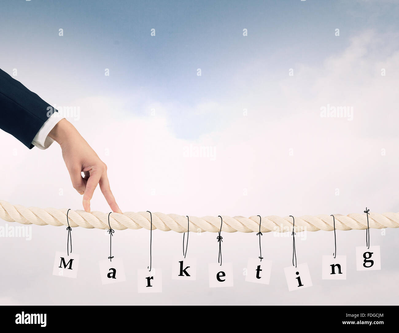 Close up of businessman hands walking with fingers on rope as ...