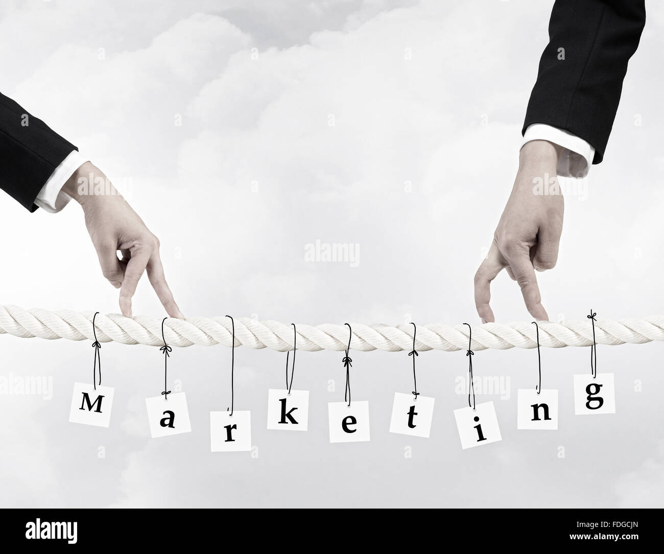 Close up of businessman hands walking with fingers on rope as ...