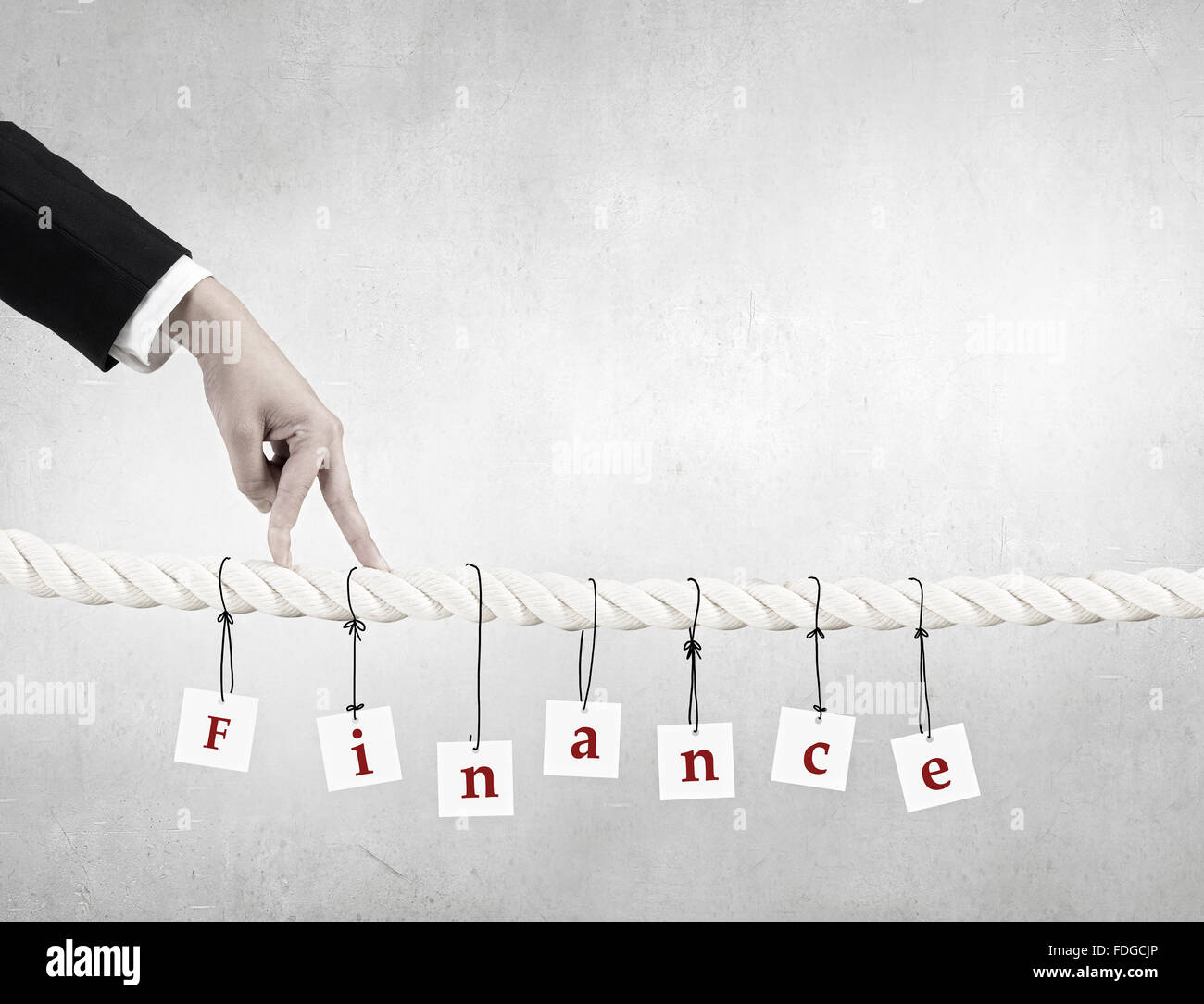 Close up of businessman hands walking with fingers on rope as ...