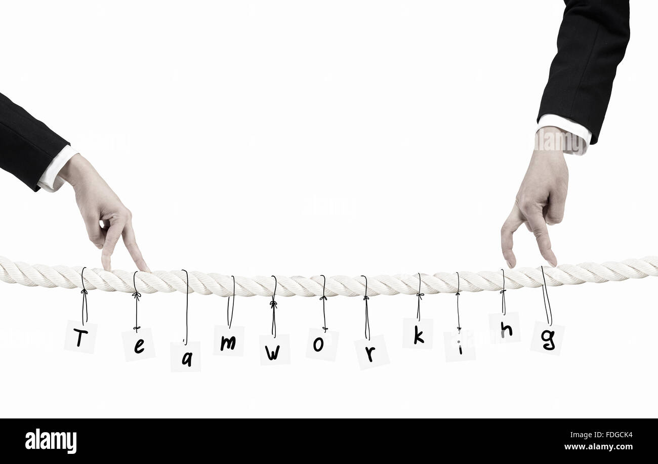 Close up of businessman hands walking with fingers on rope as ...