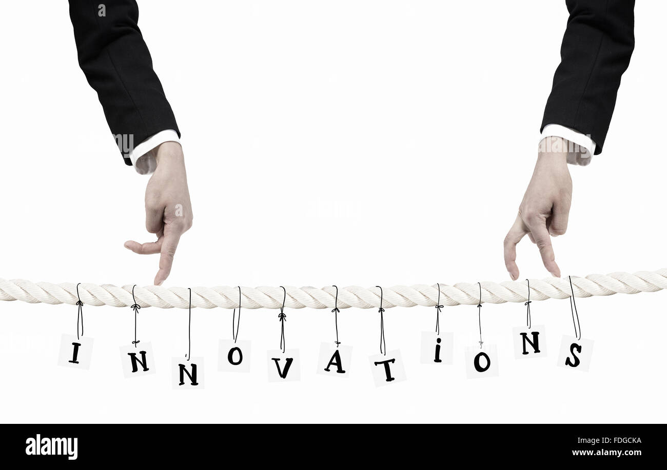 Close up of businessman hands walking with fingers on rope as ...