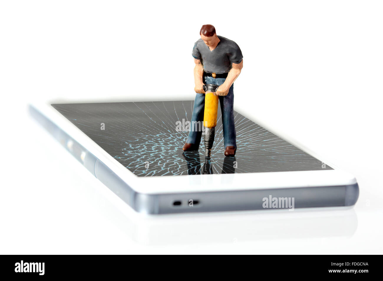 Miniature worker breaking glass of smart phone Stock Photo - Alamy