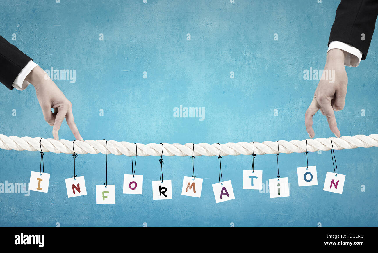 Close up of businessman hands walking with fingers on rope as ...