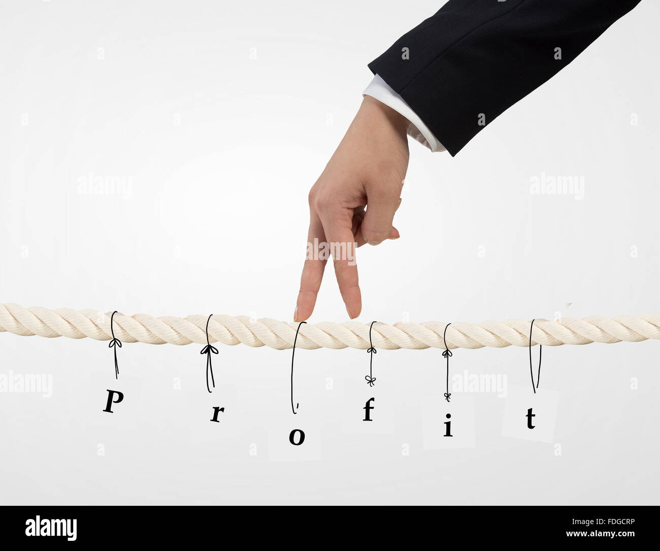 Close up of businessman hands walking with fingers on rope as ...