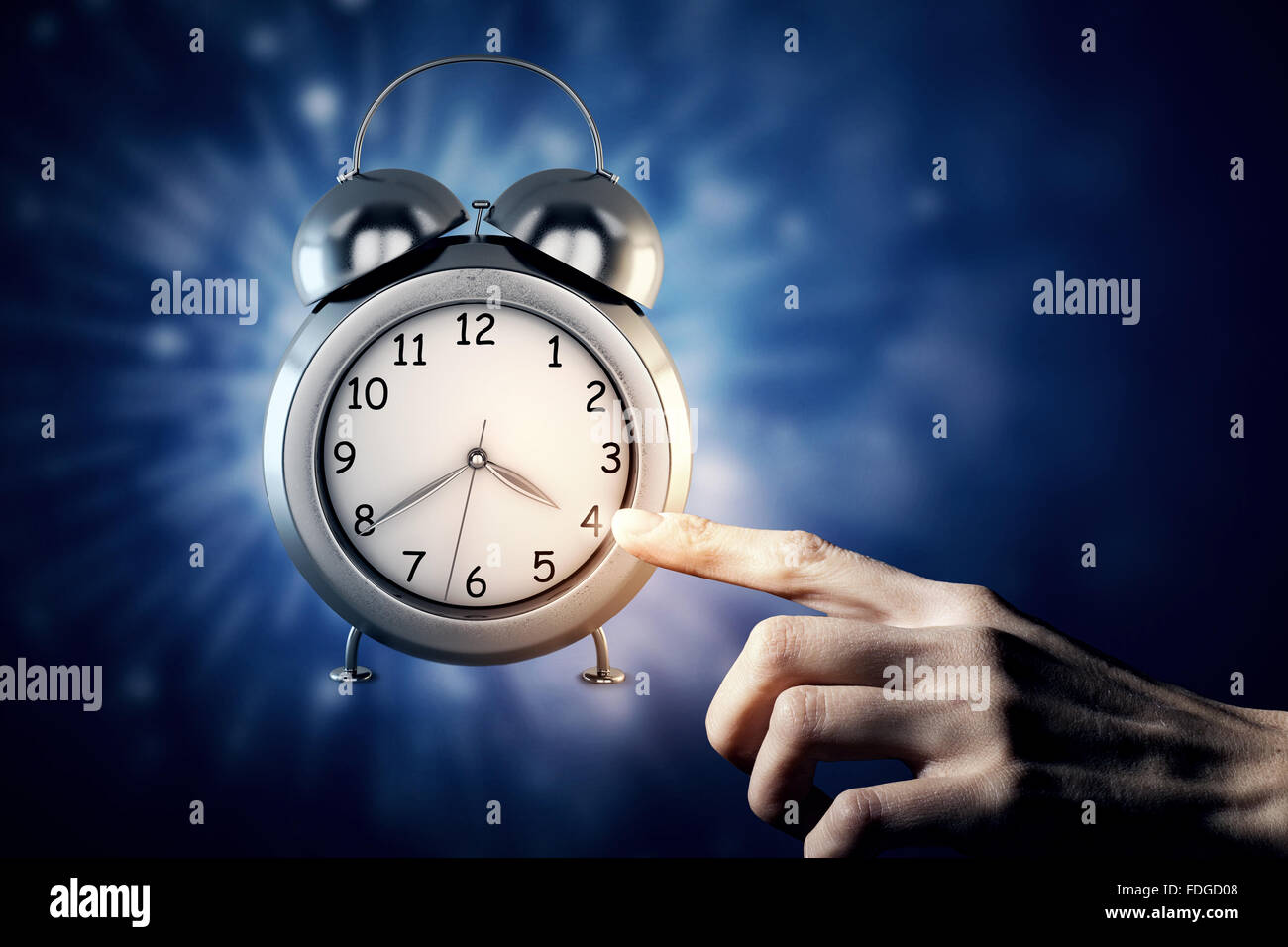 Close up image of human palms with alarm clock Stock Photo - Alamy