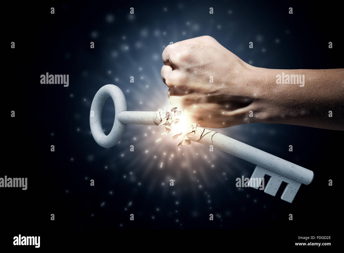 Hand of man crashing key with punch Stock Photo - Alamy