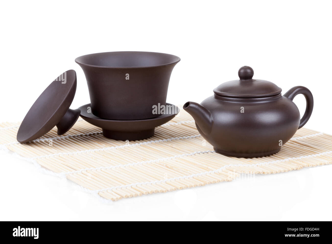 Chinese ceramic tea set bamboo mat isolated on white background Stock ...