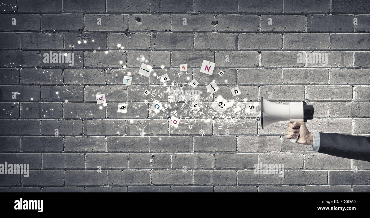 Hand loudspeaker hi-res stock photography and images - Alamy