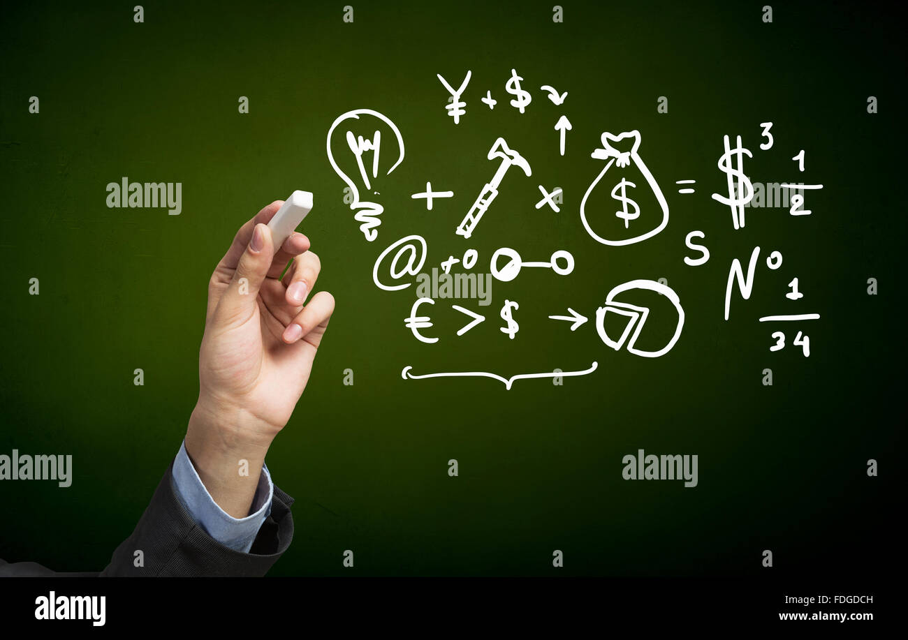 Human hand drawing money earning concept with chalk Stock Photo - Alamy