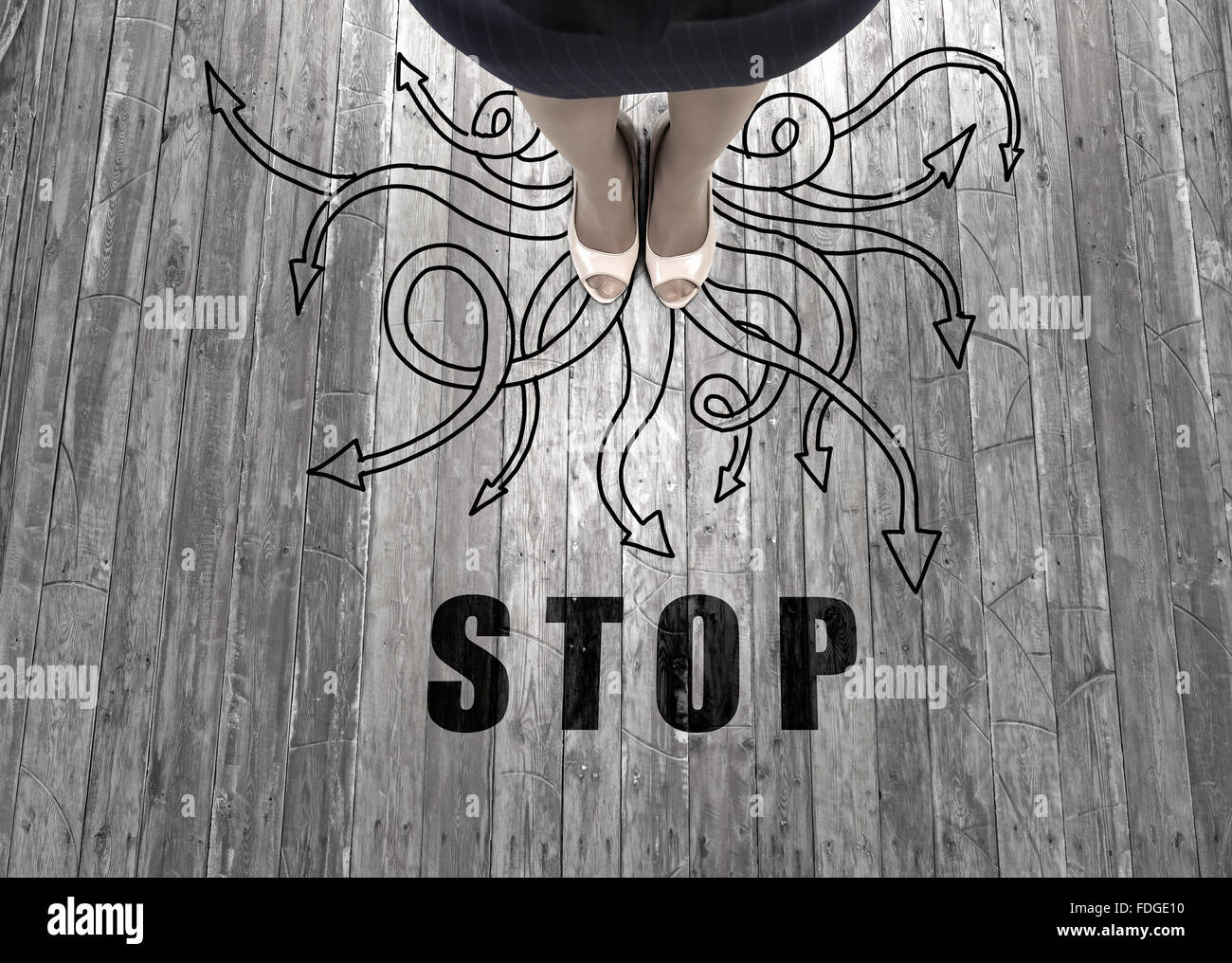Top view of businesswoman feet and stop sign Stock Photo - Alamy
