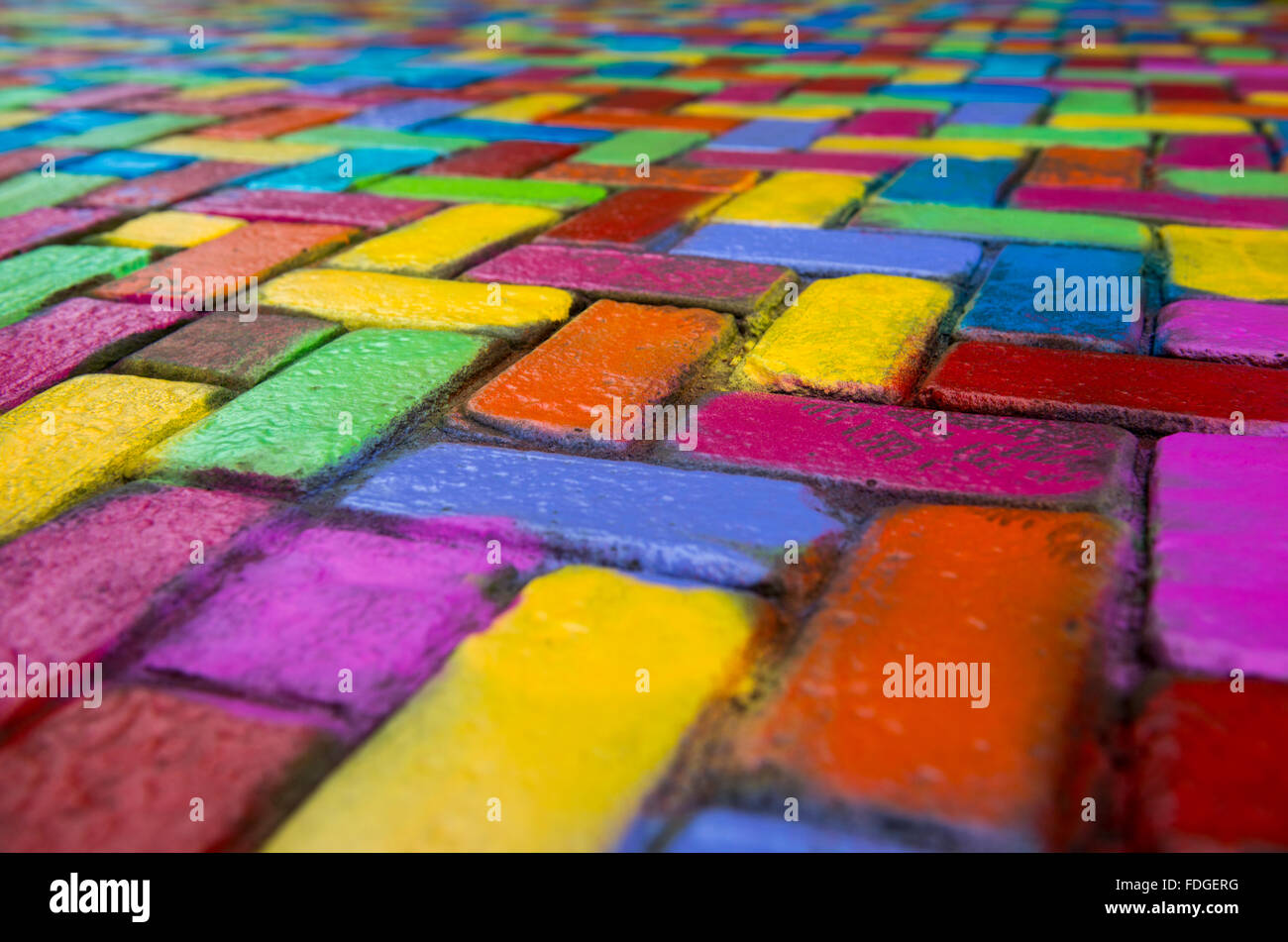Colourful paving stones on a street in the centre of Amsterdam, the ...