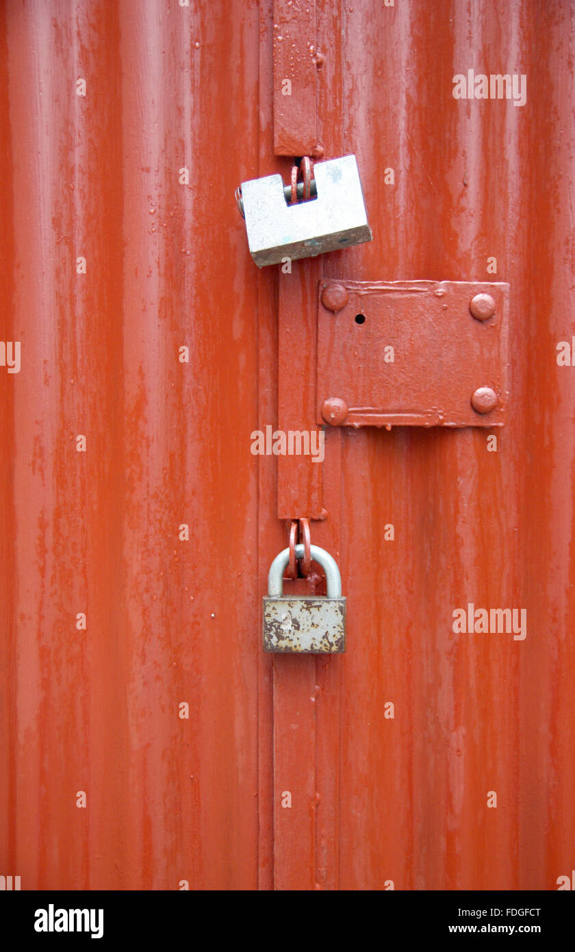 Lock on the red door Stock Photo - Alamy