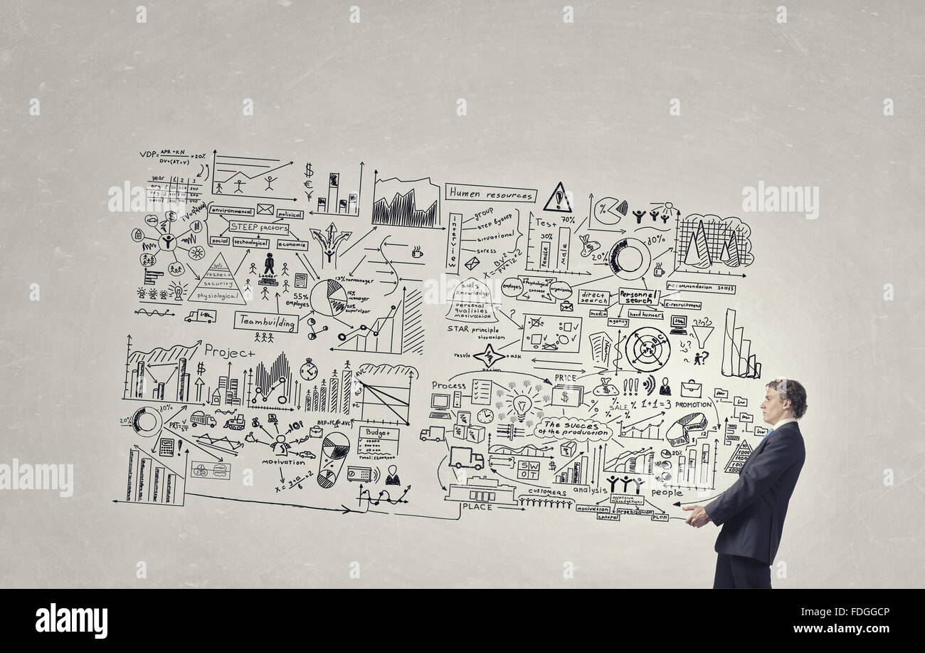 Young businessman carrying banner with his great business plan Stock ...