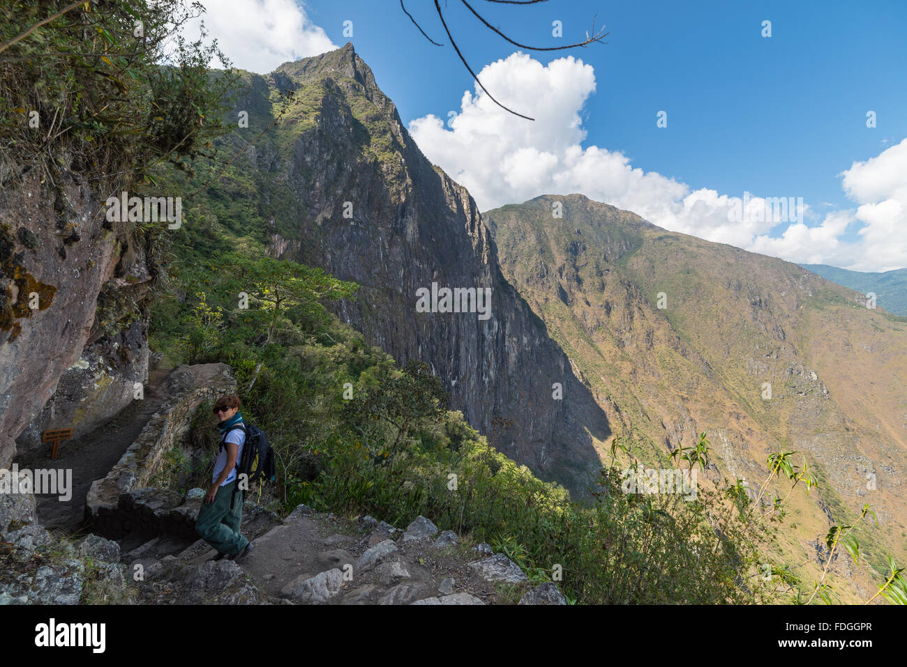 Backpacker exploring the steep and dramatic Inca Trail crossing the ...
