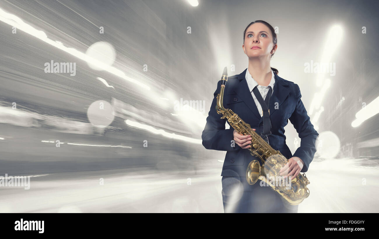 Saxophone pose hi-res stock photography and images - Alamy