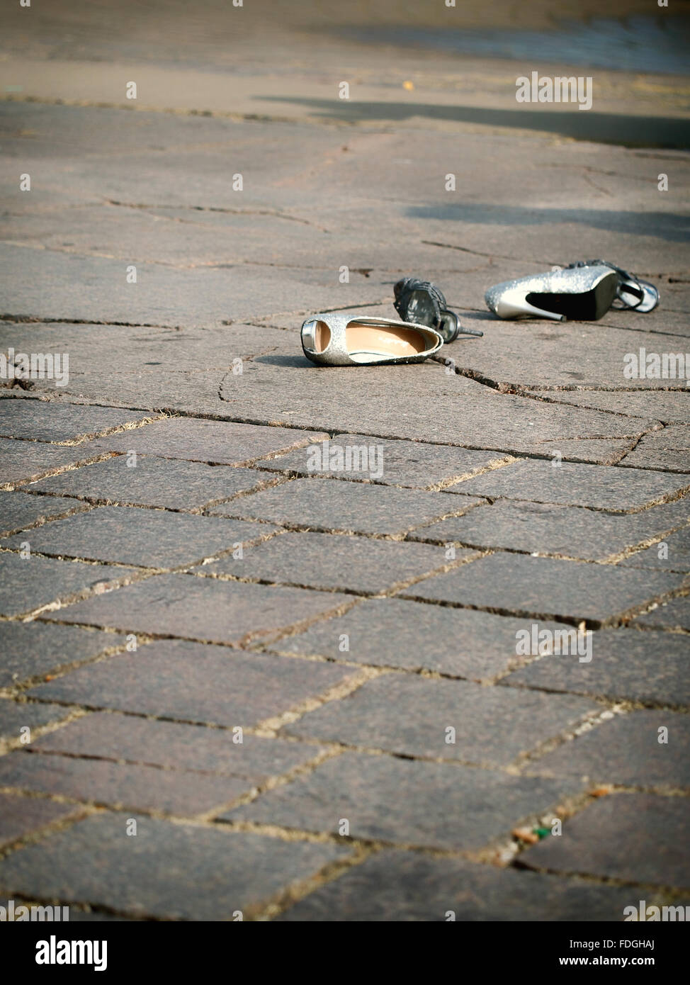 Discarded shoes on street hi-res stock photography and images - Alamy