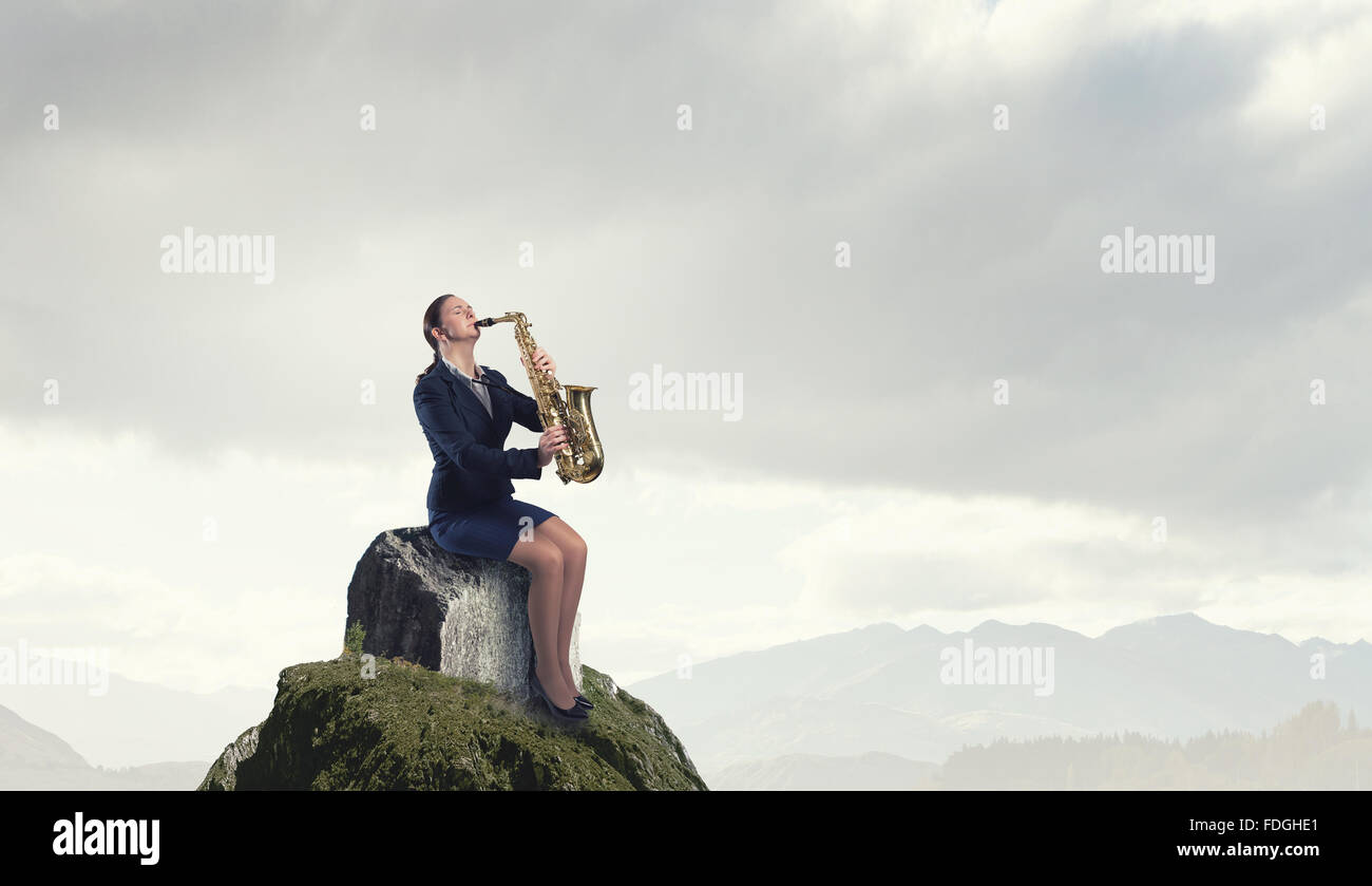 Saxophone pose hi-res stock photography and images - Alamy