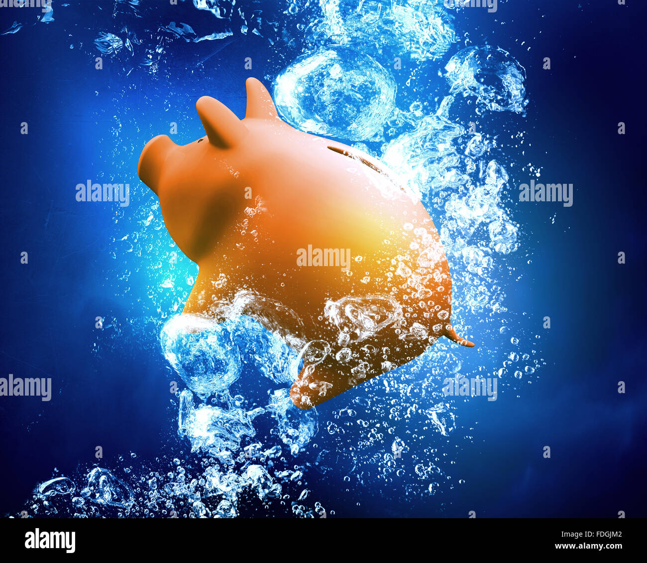 Piggy bank sink in clear blue water Stock Photo - Alamy