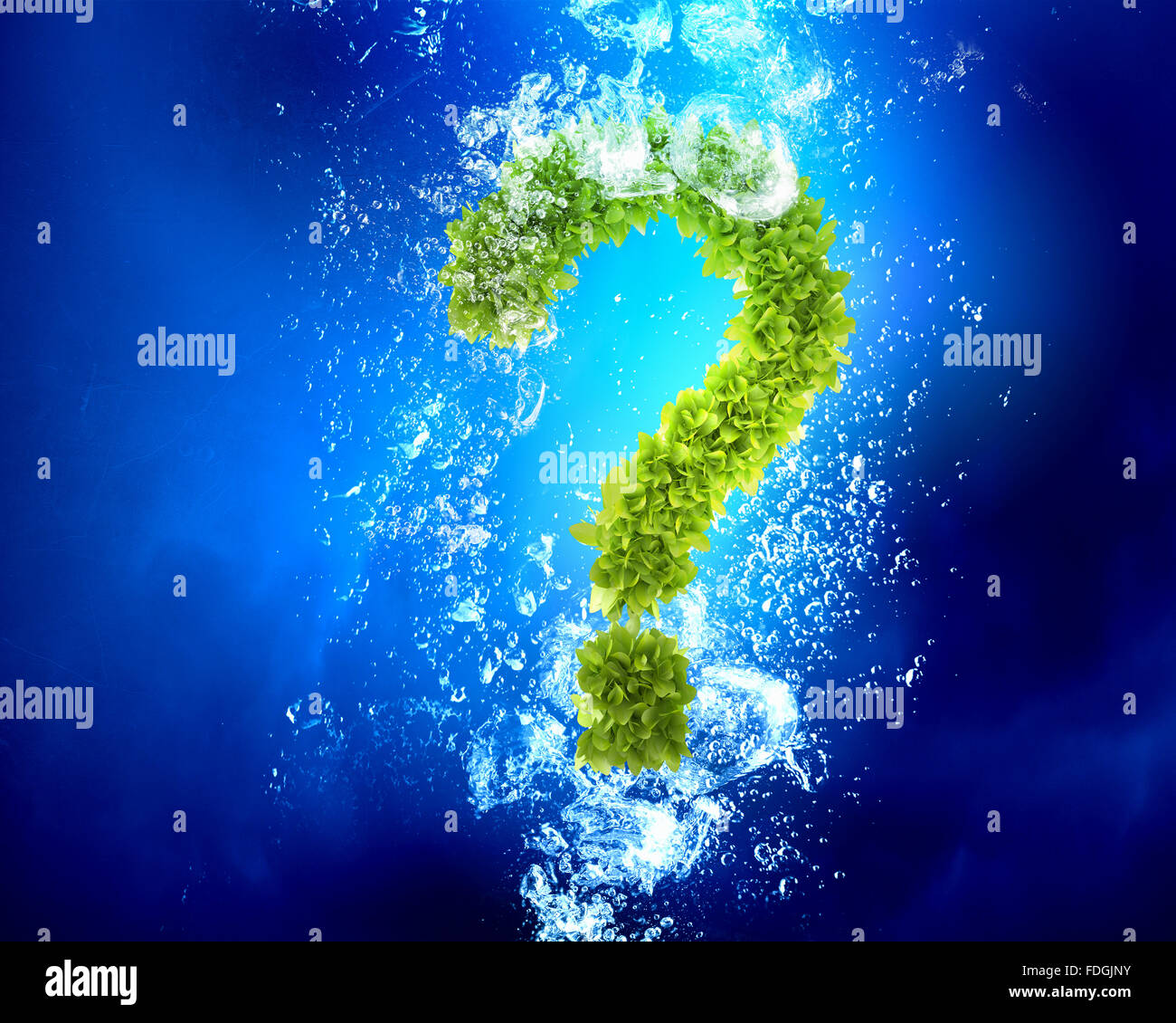 Green question mark in clear blue water Stock Photo - Alamy