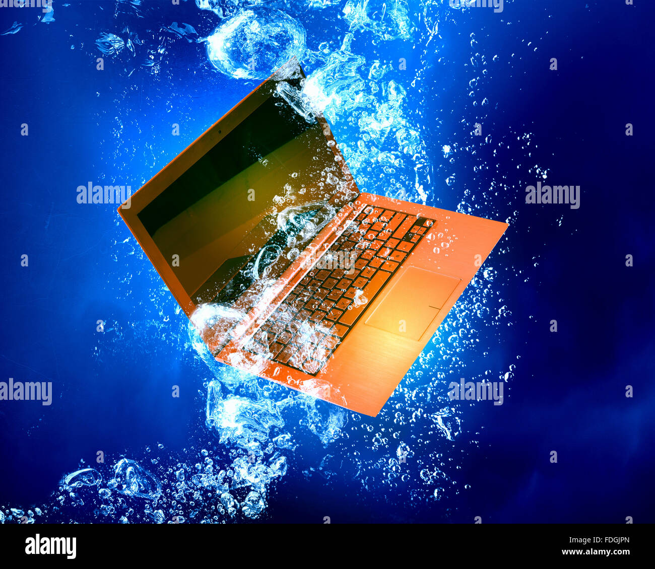 Laptop computer sink in clear blue water Stock Photo - Alamy