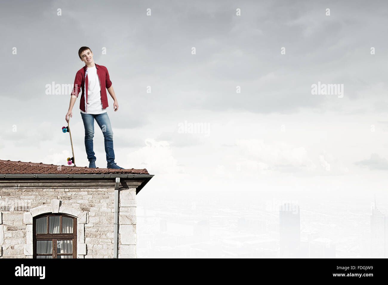 Handsome teenager cool acive boy riding skateboard Stock Photo - Alamy