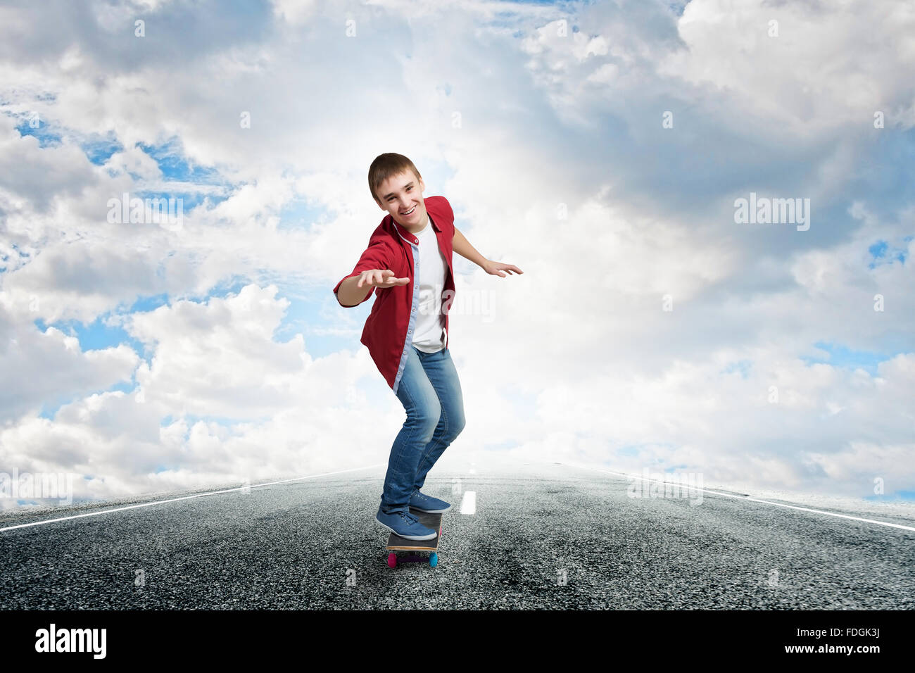 Handsome teenager cool acive boy riding skateboard Stock Photo - Alamy