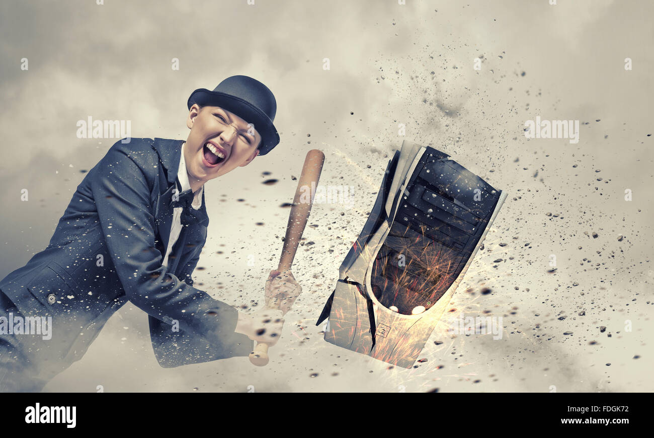 Young crazy woman damaging computer processor with baseball bat Stock ...