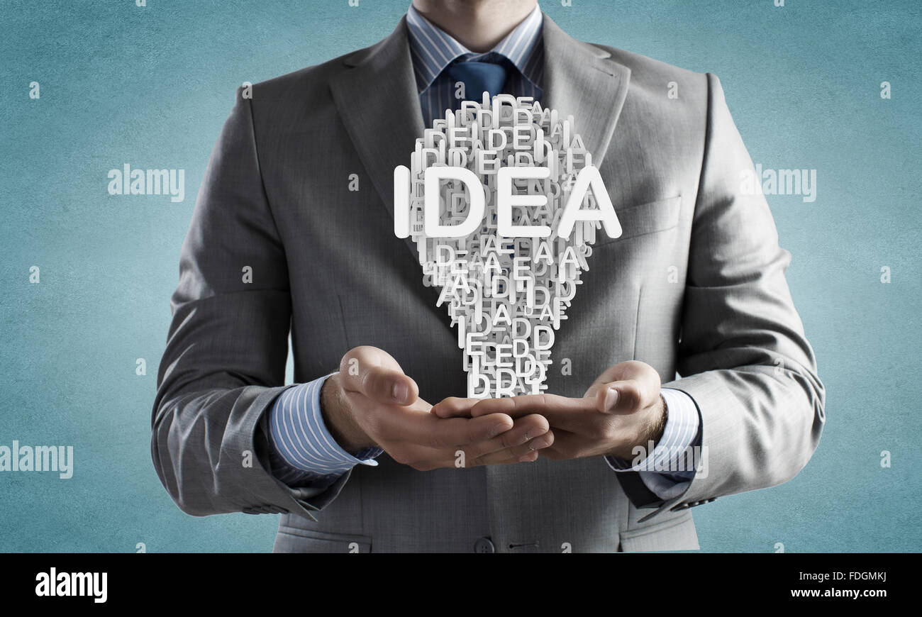 Businessman holding in hands successful idea concept Stock Photo - Alamy