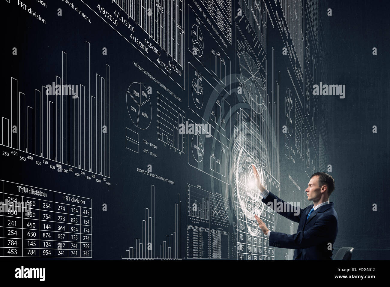 Businessman in chair working with virtual panel Stock Photo - Alamy