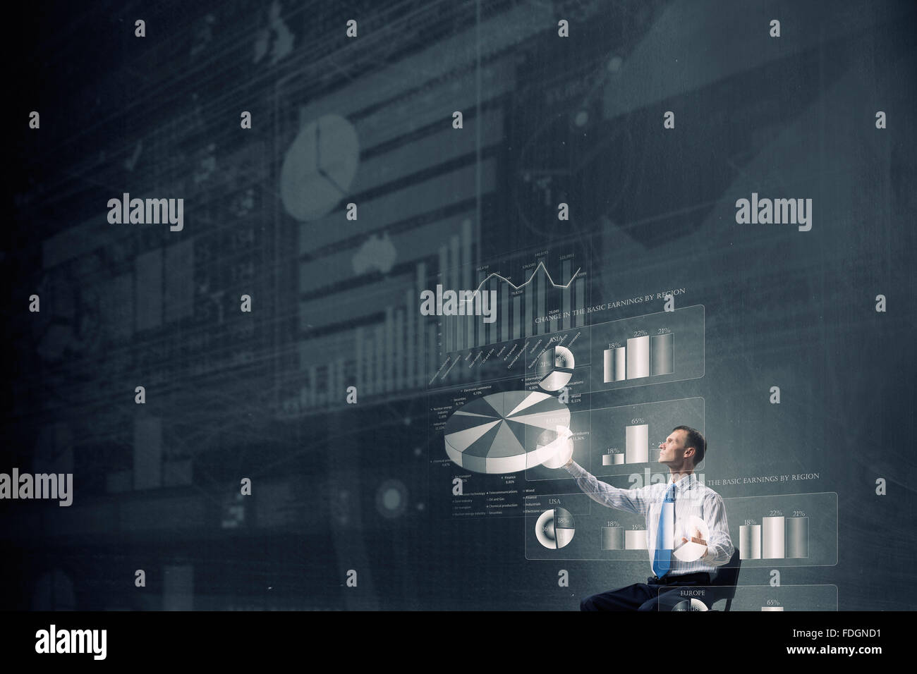 Businessman in chair working with virtual panel Stock Photo - Alamy