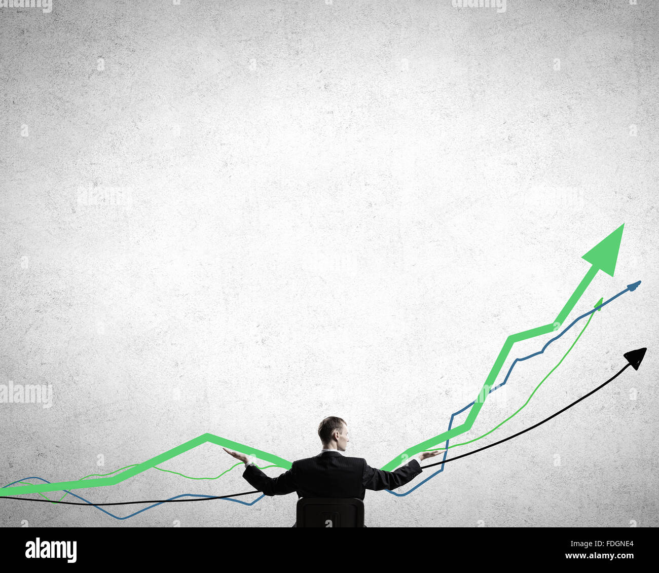 Back view of businessman hold growth arrow graph Stock Photo - Alamy