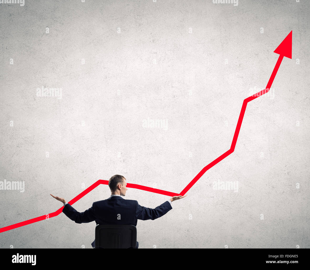 Back view of businessman hold growth arrow graph Stock Photo - Alamy