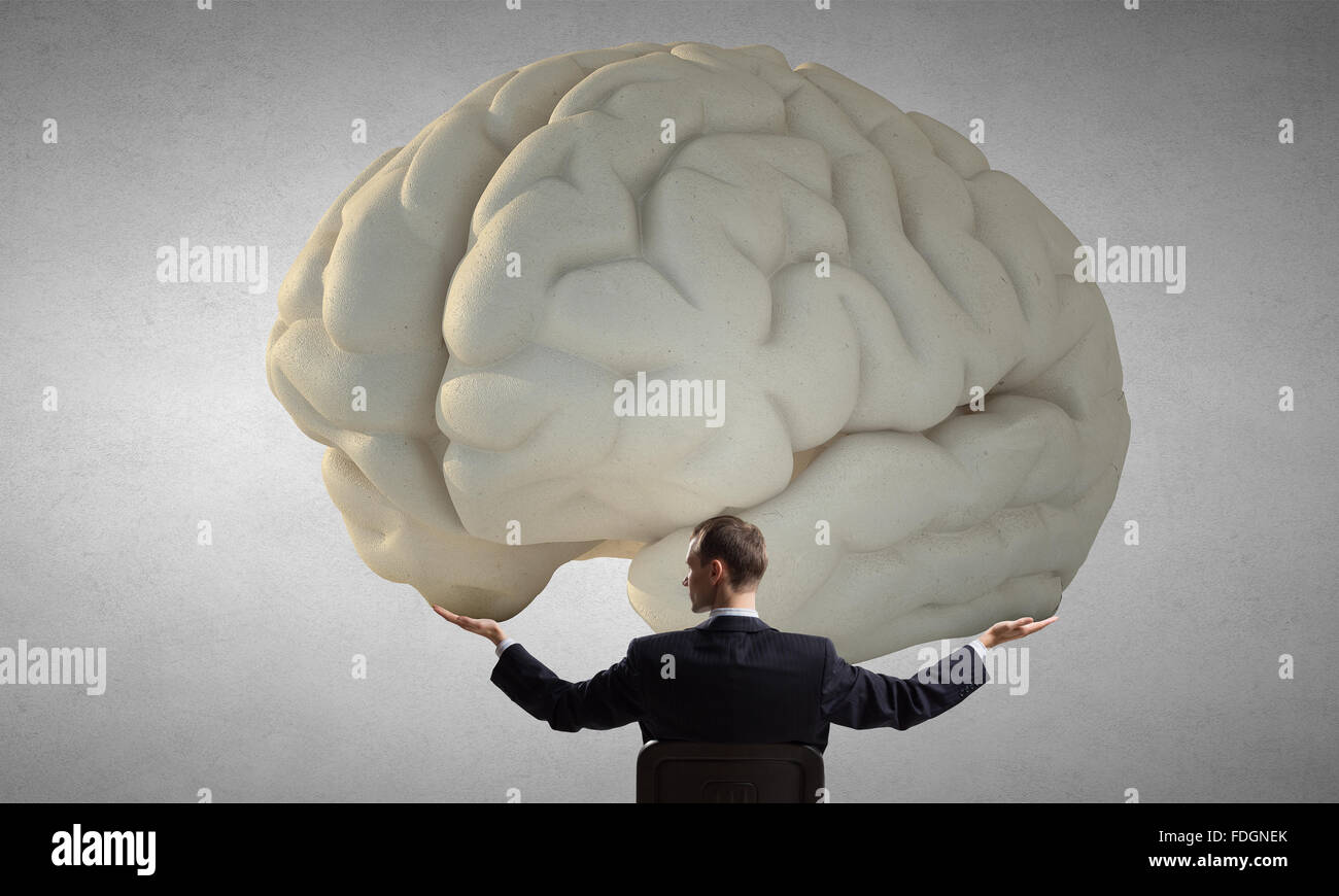 Back view of businessman sitting in chair and mind concept Stock Photo ...
