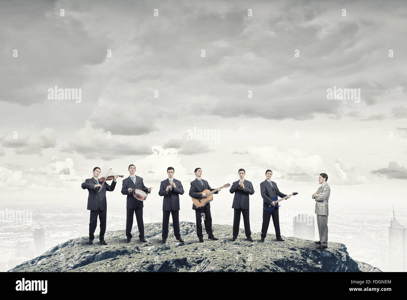 Man orchestra in suit playing different music instruments Stock Photo ...