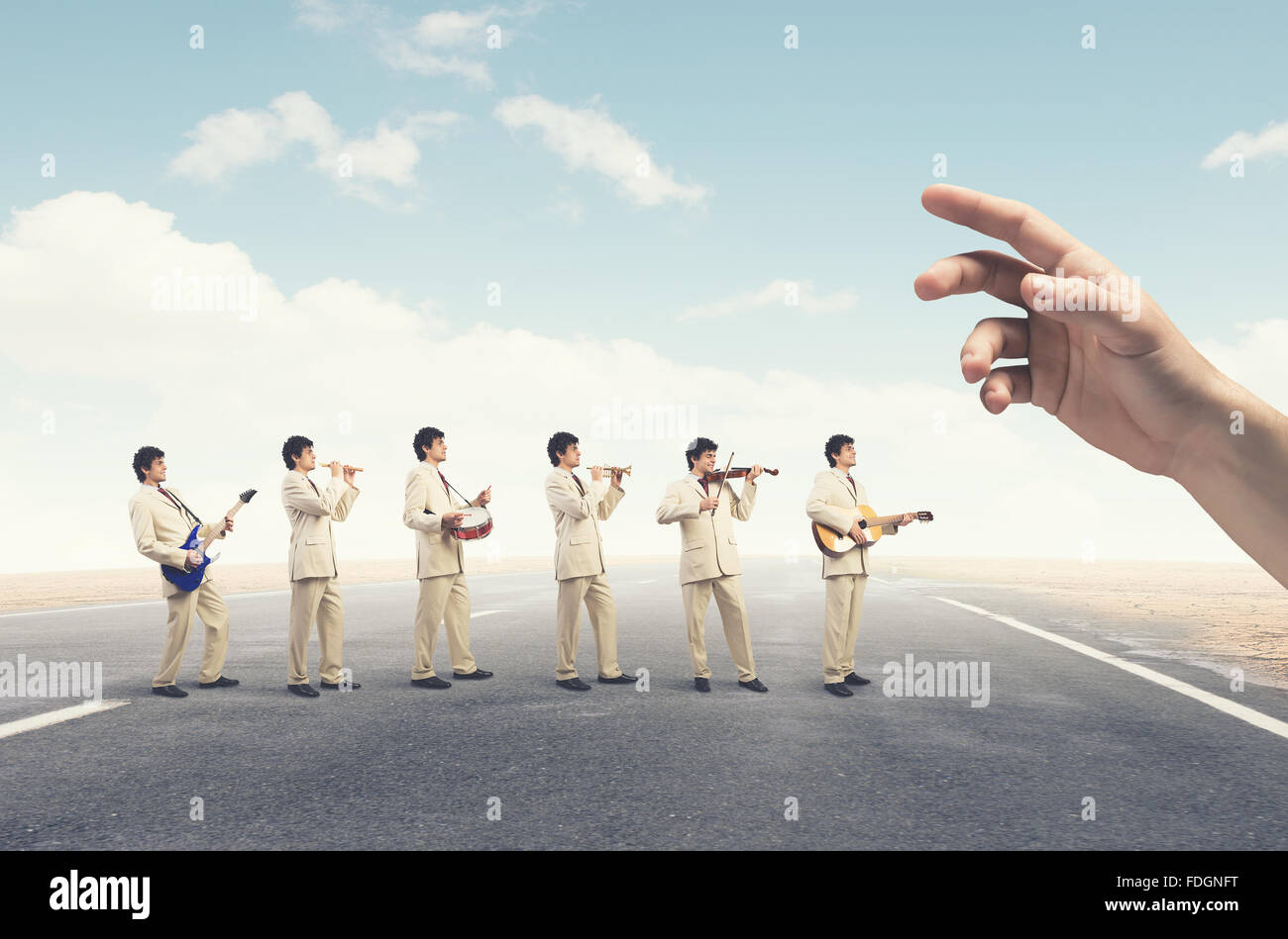 Man orchestra in suit playing different music instruments Stock Photo ...